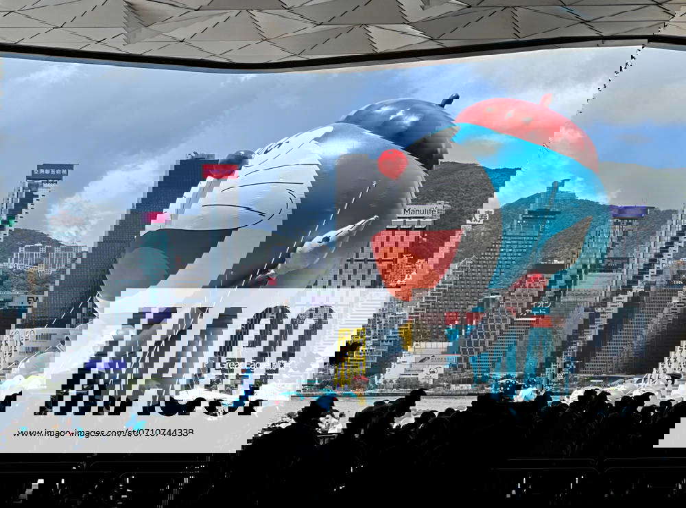 HONG KONG, CHINA - JULY 13: Visitors watch a 12-metre inflatable ...