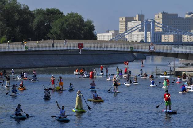 MOSCOW, People take part in a fancy dressed SUP surfing festival in ...