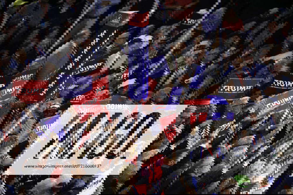 Delegates from Arkansas react as they cast their 40 delegates for ...