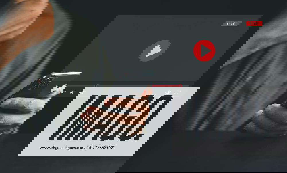 Man enjoying video streaming on virtual screen with a smartphone ...