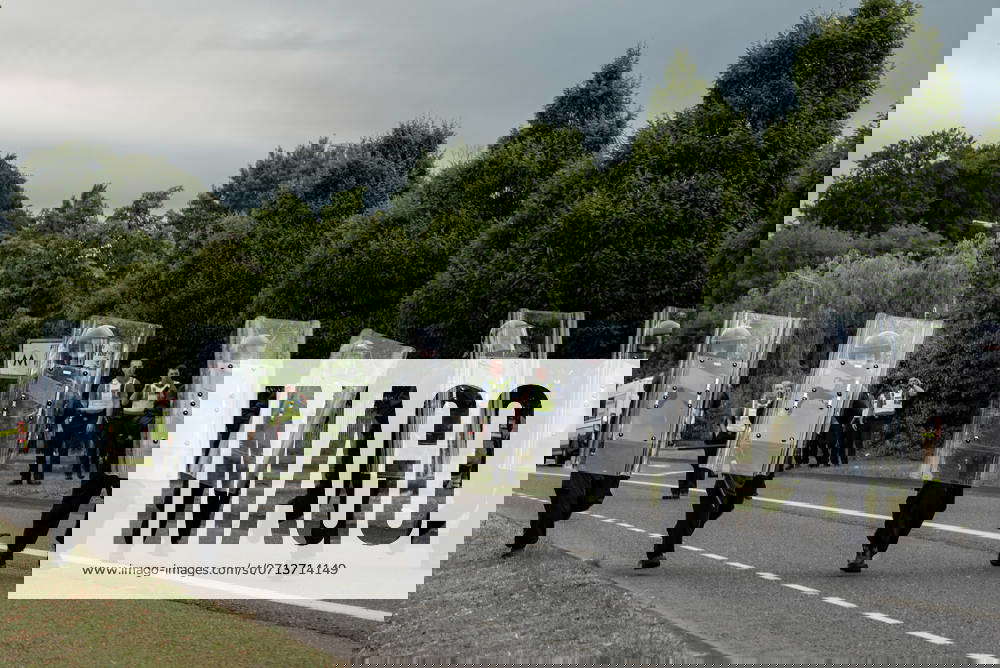 Dublin, Ireland: Riot police marches towards protesters during the ...