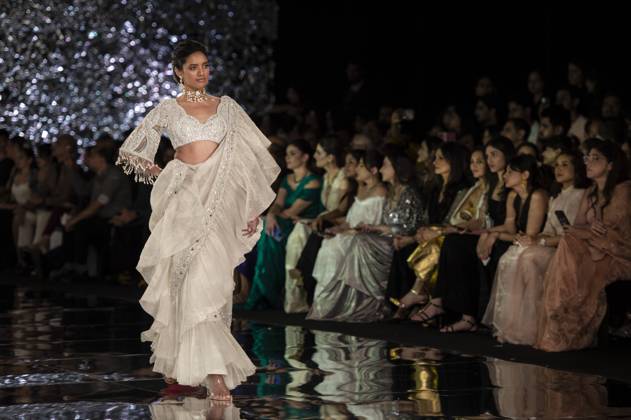 NEW DELHI, A model displays creations by Indian designer Suneet Verma ...