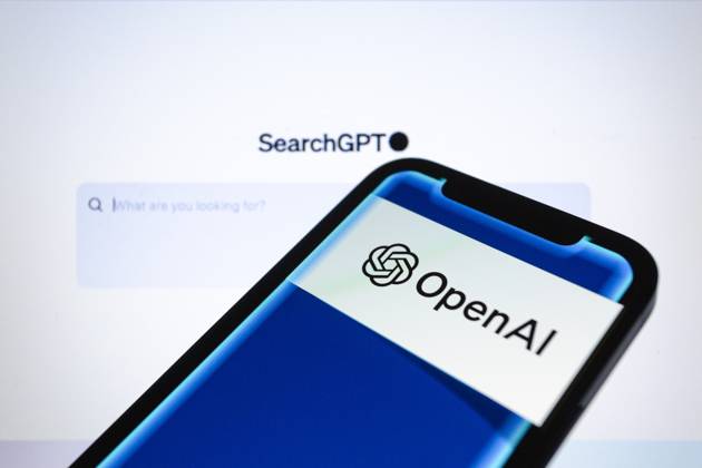 Asuncion, Paraguay: Logo of OpenAI is displayed on a smartphone backdropped by SearchGPT featured
