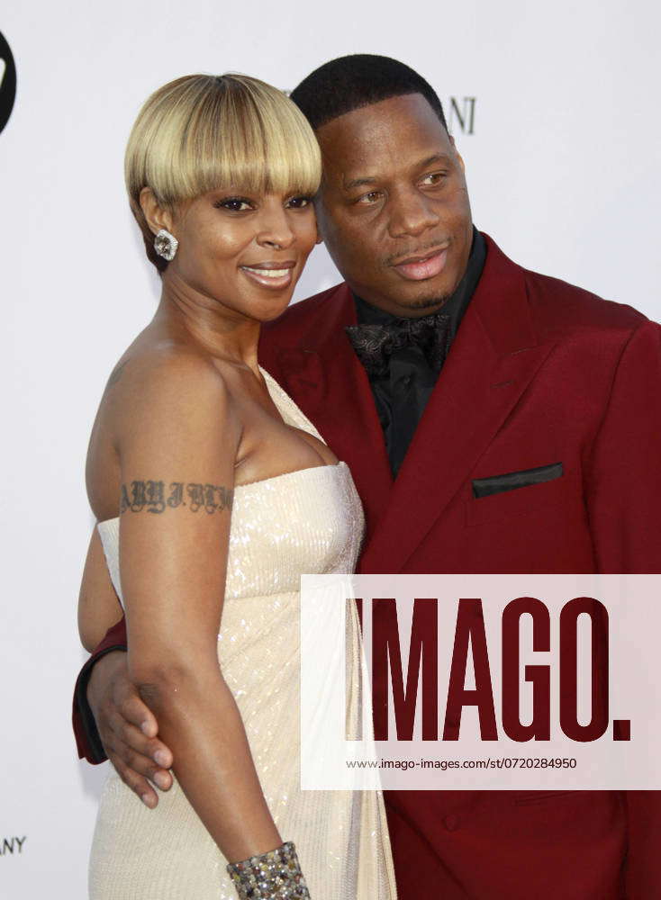 Mary J Blige and Kendu Isaacs at amfAR s Cinema Against Aids Gala ...