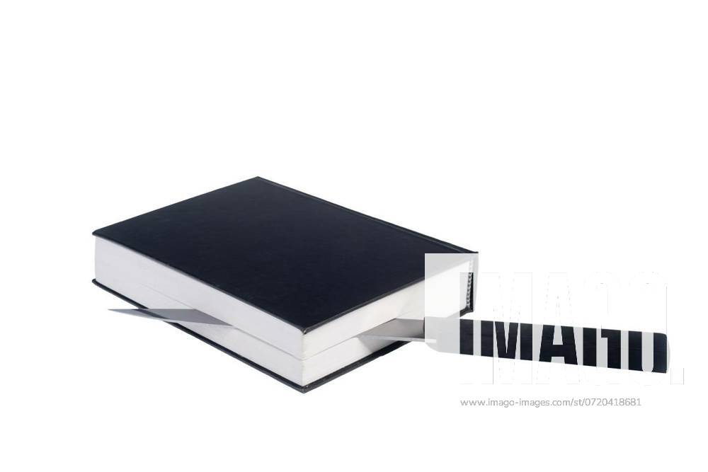 A book cut with the knife, a book cut into slices with the knife on a ...