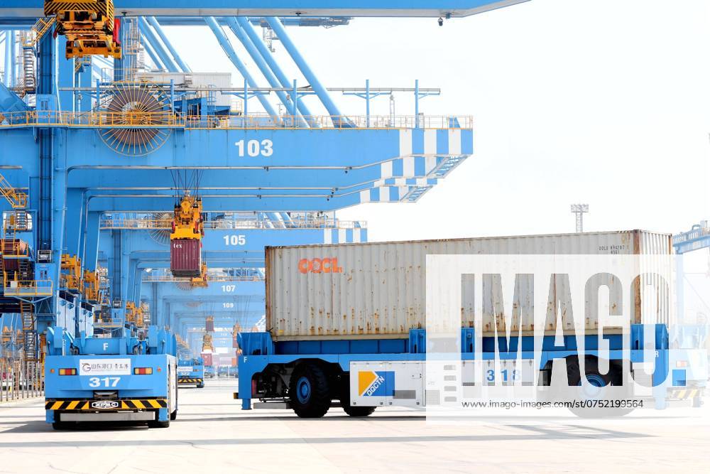 Qingdao Port Fully Automated Wharf Cargo ships are loading and unloading foreign trade containers