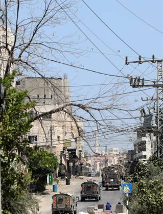 TUBAS, Aug. 14, 2024 -- Israeli military vehicles are seen during an ...