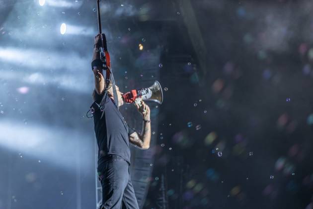 the us american punk rock band Rise Against vocals, rhythm guitar Tim ...