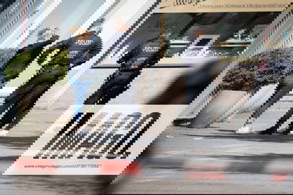 Police officers guard the crime scene in Solingen city center Terrorist ...