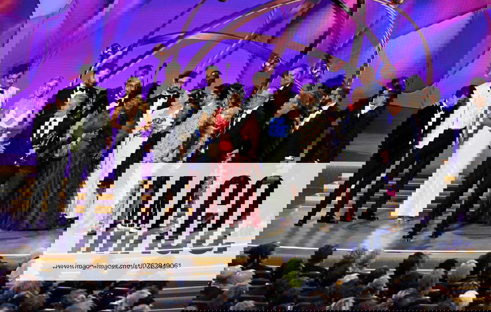 Jon Stewart, cast, and crew accept the Outstanding Talk Series award ...