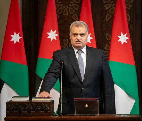 The prime minister and ministers of the new Jordanian government take ...