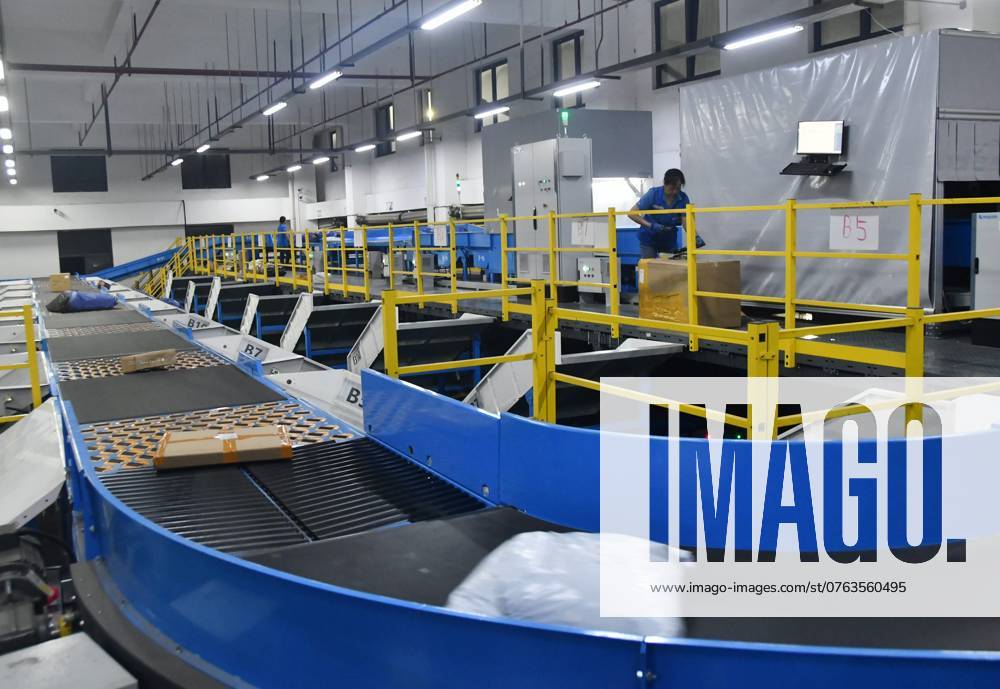 National Postal Express Industry HANDAN, CHINA - Workers sort ...