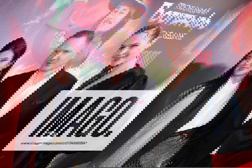 RUSSIA, MOSCOW - SEPTEMBER 25, 2024: Film director Anton Maslov poses with actresses Evelina