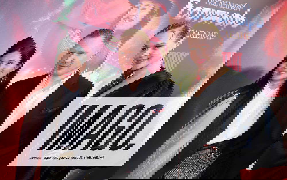 RUSSIA, MOSCOW - SEPTEMBER 25, 2024: Film director Anton Maslov poses with actresses Evelina