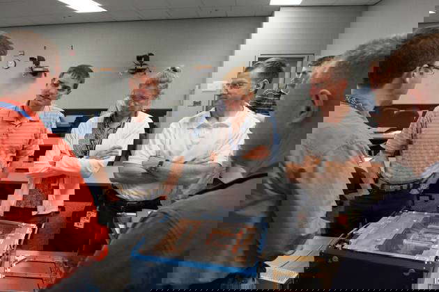 JSC2011-E-029133 - STS-135 crew members participate in an Animal ...