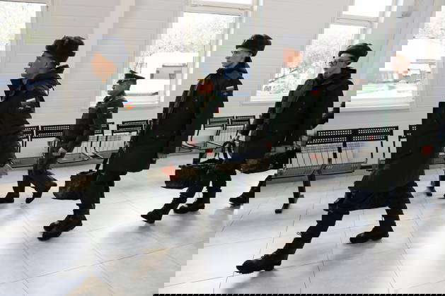 RUSSIA, MOSCOW - : Conscripts are seen at a local draft office before ...