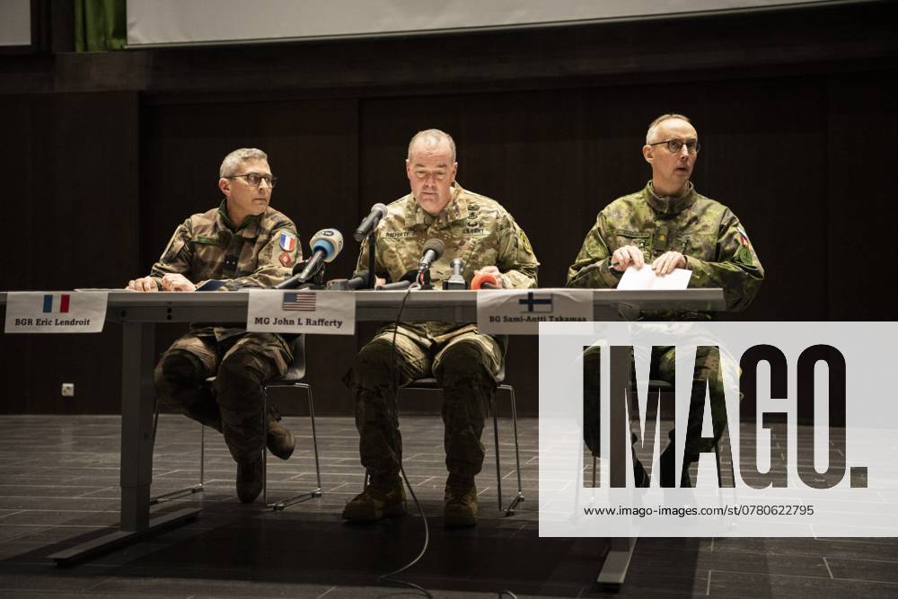 French brigadier general Eric Lendroit (L), U.S Major General John L ...