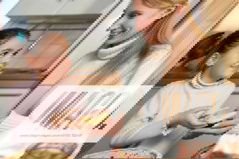 Little girl giving her mother a crepe, model released, 5611450, _ M ...