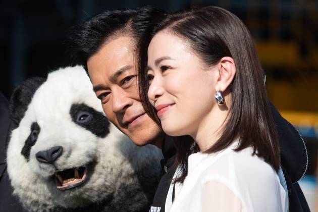 A panda mascot, Hong Kong actors Louis Koi and Charmaine Sheh attend ...