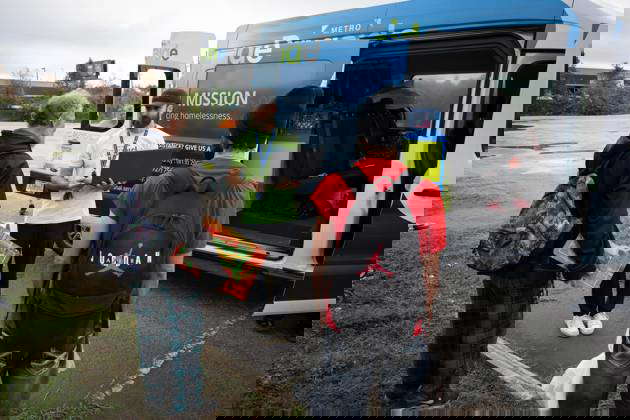 Hudson, Florida, USA: Metro BrigAIDe Mobile Outreach members distribute ...