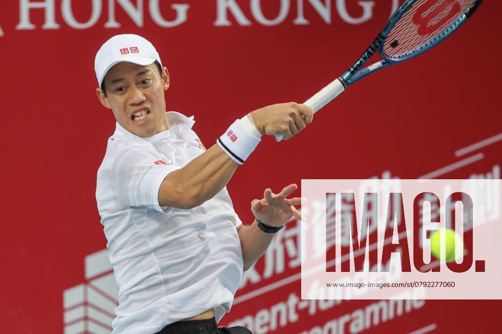 Kei Nishikori of Japan plays a shot against Jerry Shang Juncheng at the Bank of China Hong Kong