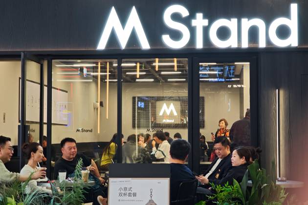 M Stand Coffee SHANGHAI, CHINA - Customers are having coffee and ...